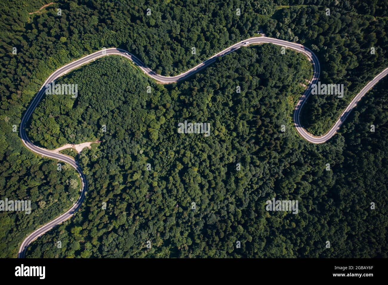 Aerial view on mountain road from drone Stock Photo - Alamy