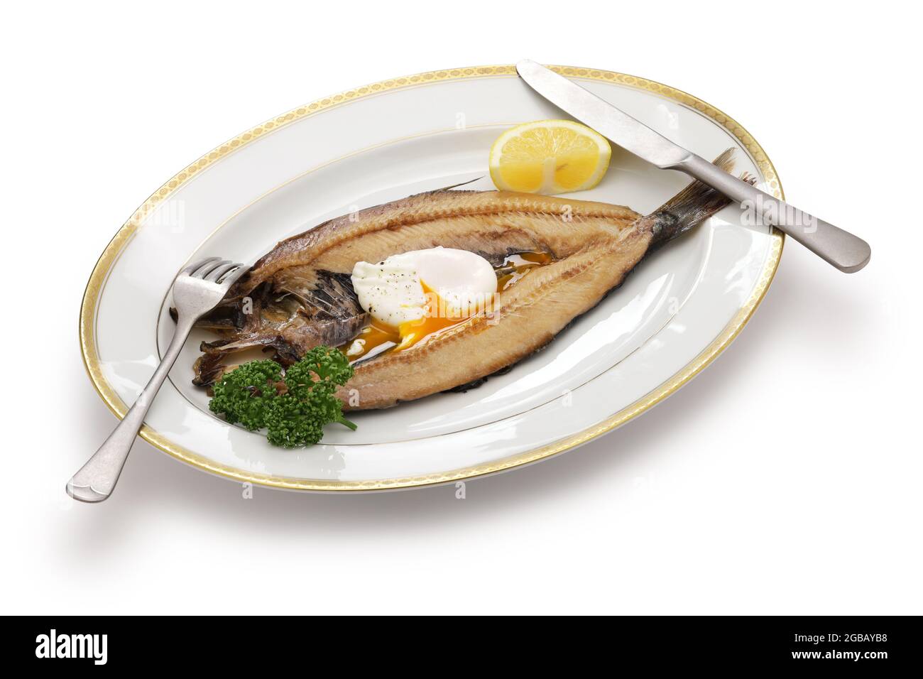 kipper(smoked herring) and poached egg, traditional British breakfast ...