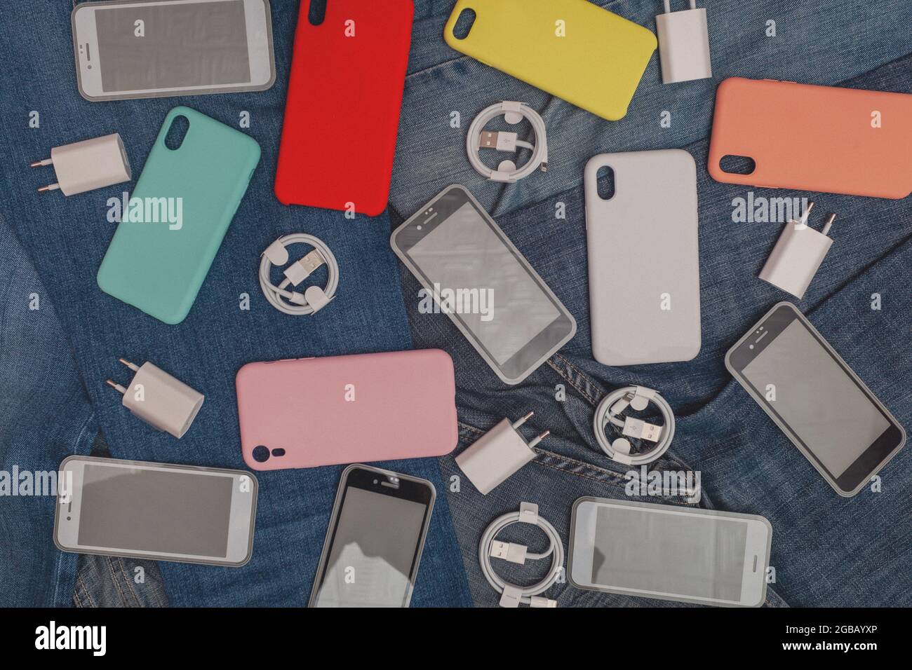 texture of mobile phone accessories on a denim background Stock Photo ...