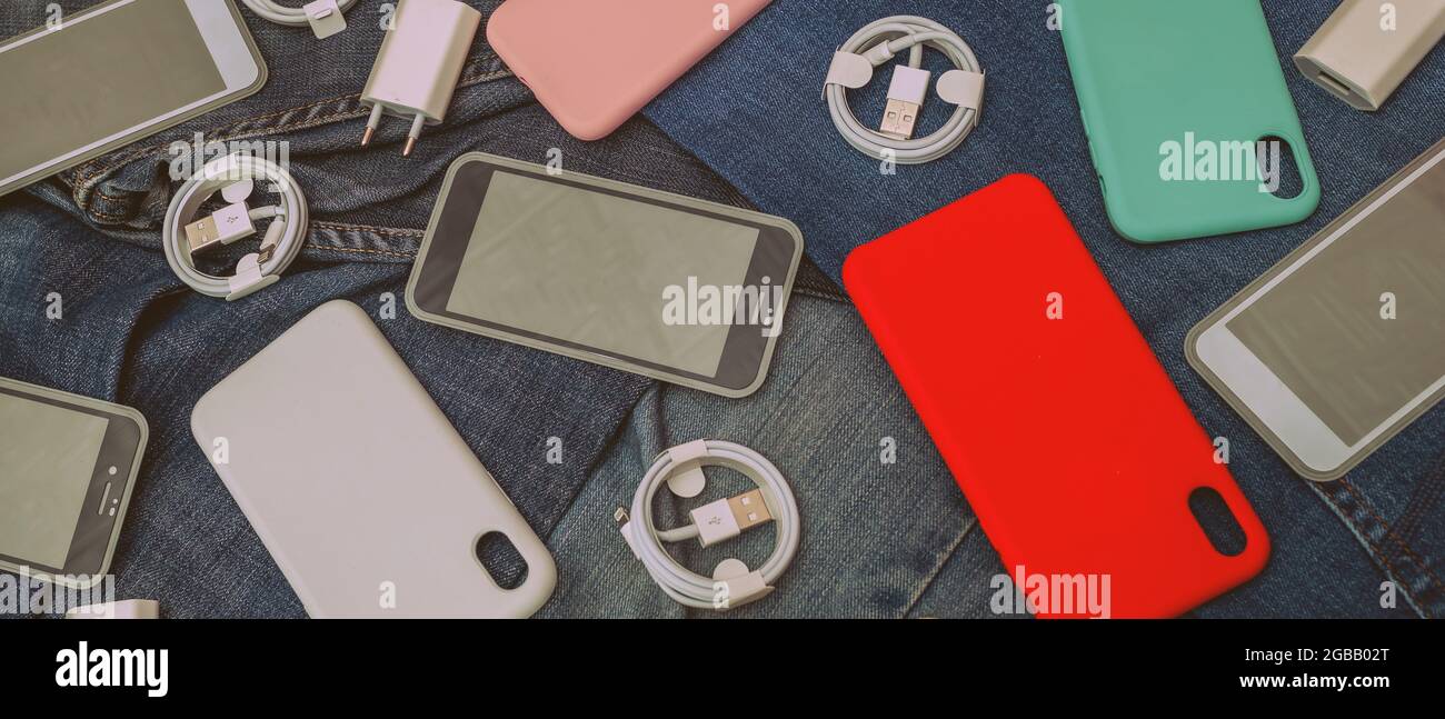 texture of mobile phone accessories on a denim background Stock Photo ...