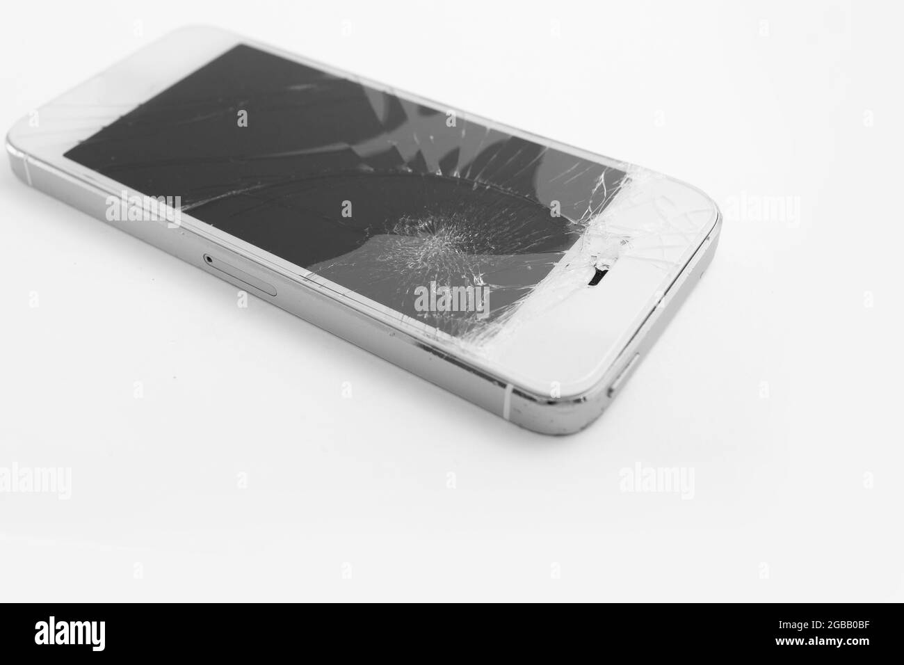 broken mobile phone display on a white background Stock Photo - Alamy