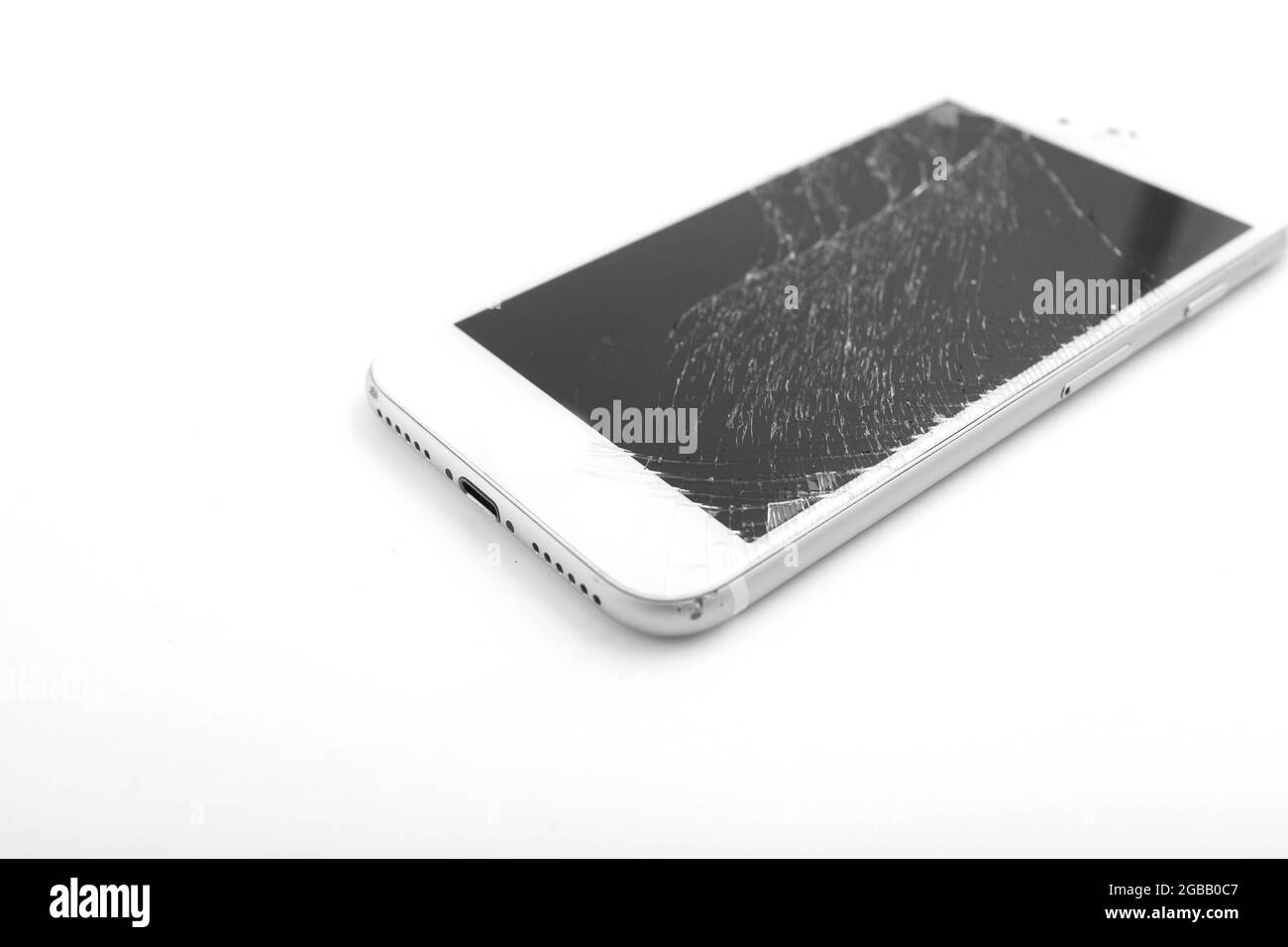broken mobile phone display on a white background Stock Photo - Alamy