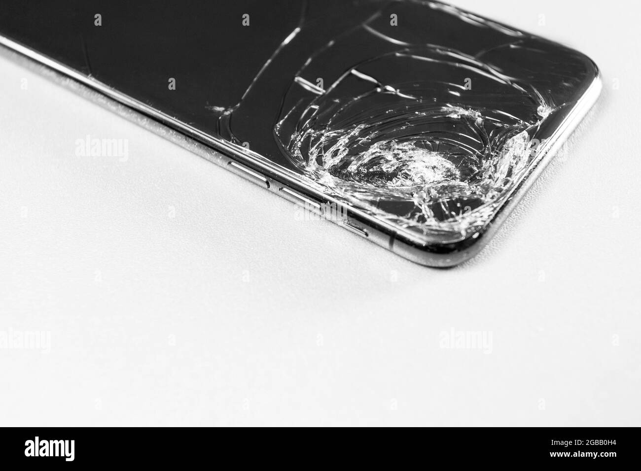 broken mobile phone display on a white background Stock Photo - Alamy