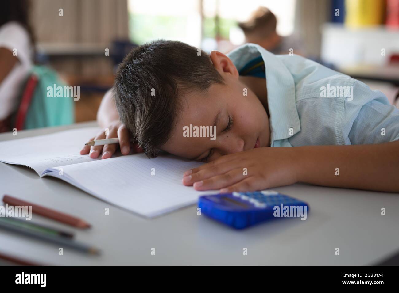 Sleeping boy classroom hi-res stock photography and images - Alamy