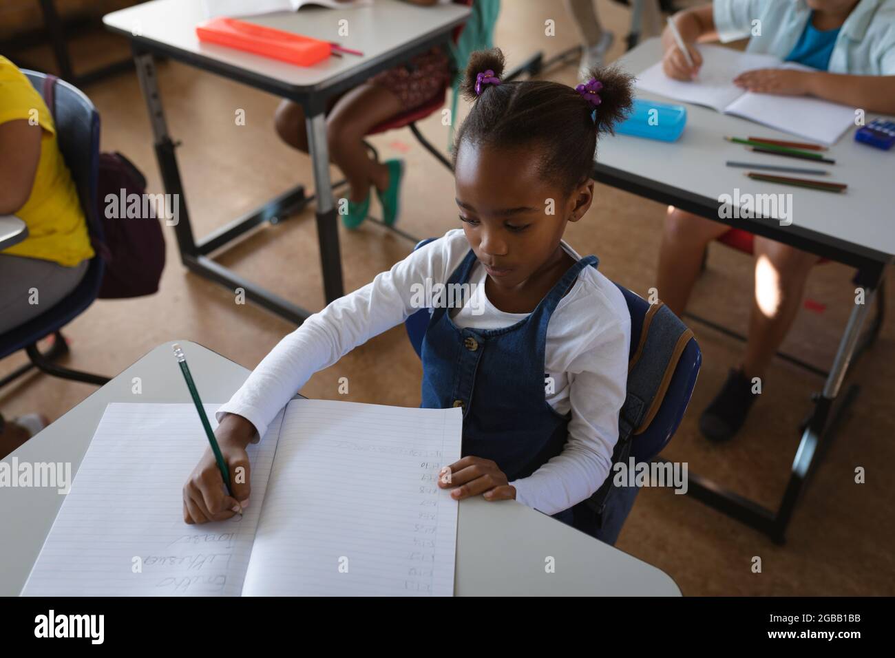 African school girl studying hi-res stock photography and images - Alamy