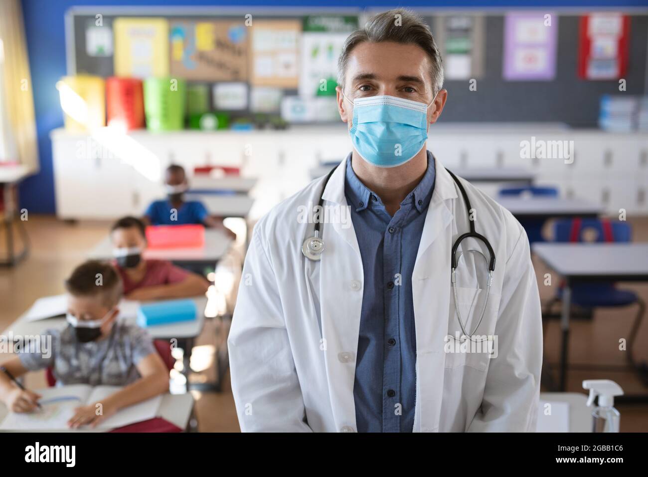 Male student wearing mask hi-res stock photography and images - Alamy