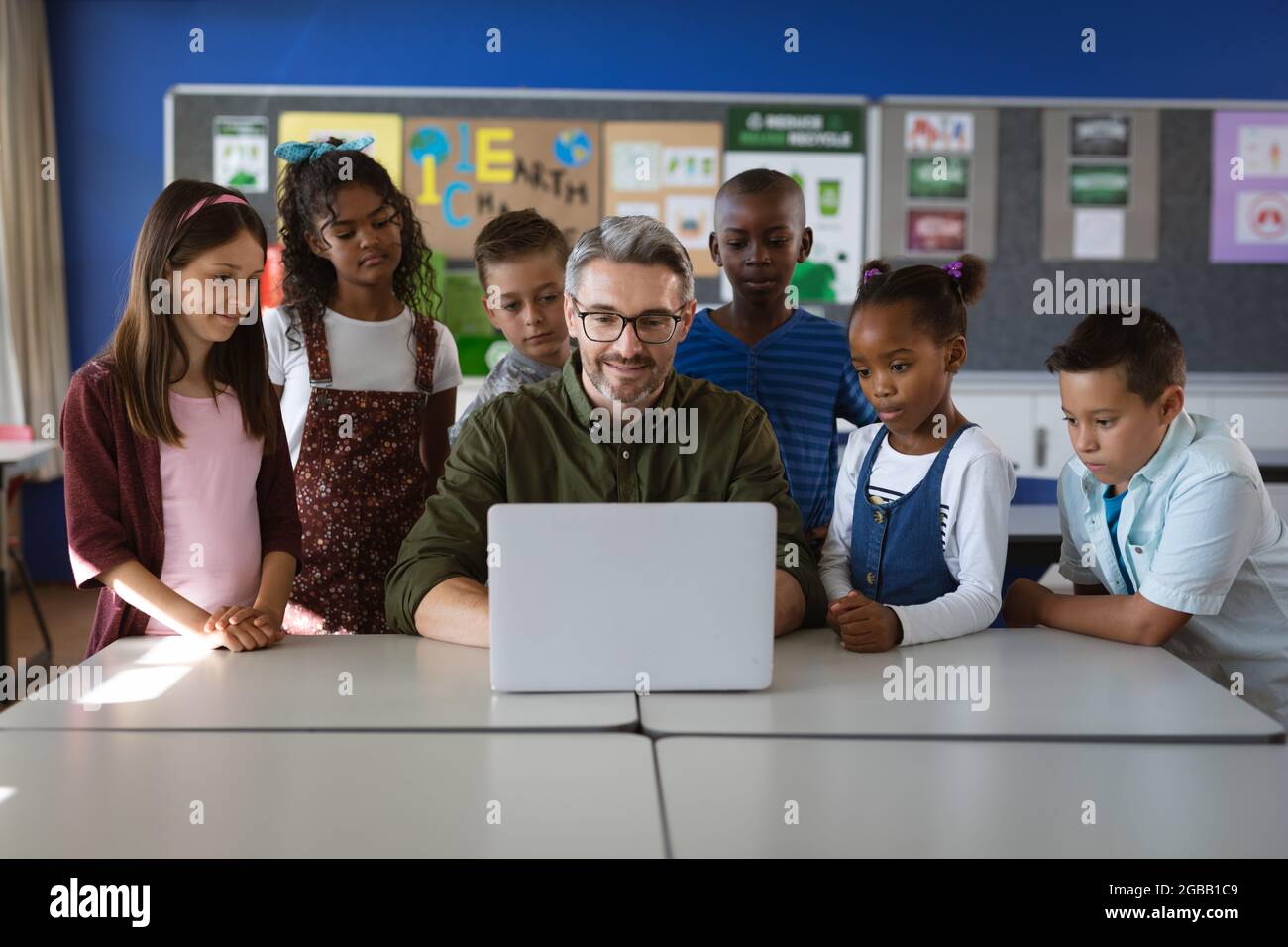 Students using laptop in class hi-res stock photography and images - Alamy