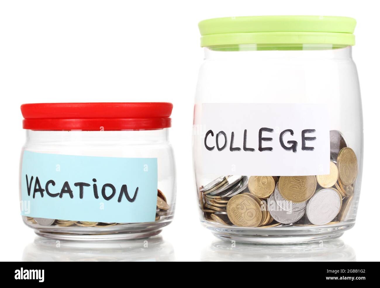 Glass banks for tips with money isolated on white Stock Photo - Alamy