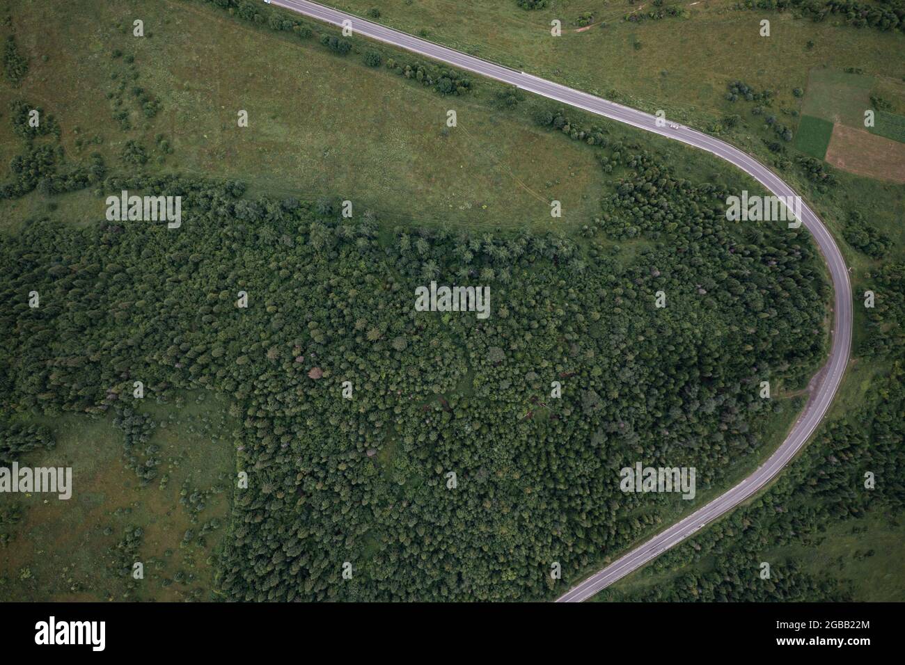 Aerial view on mountain road from drone Stock Photo - Alamy