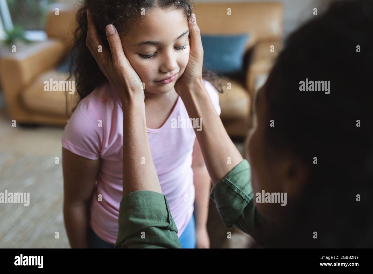 Father touching daughters head hi-res stock photography and images - Alamy
