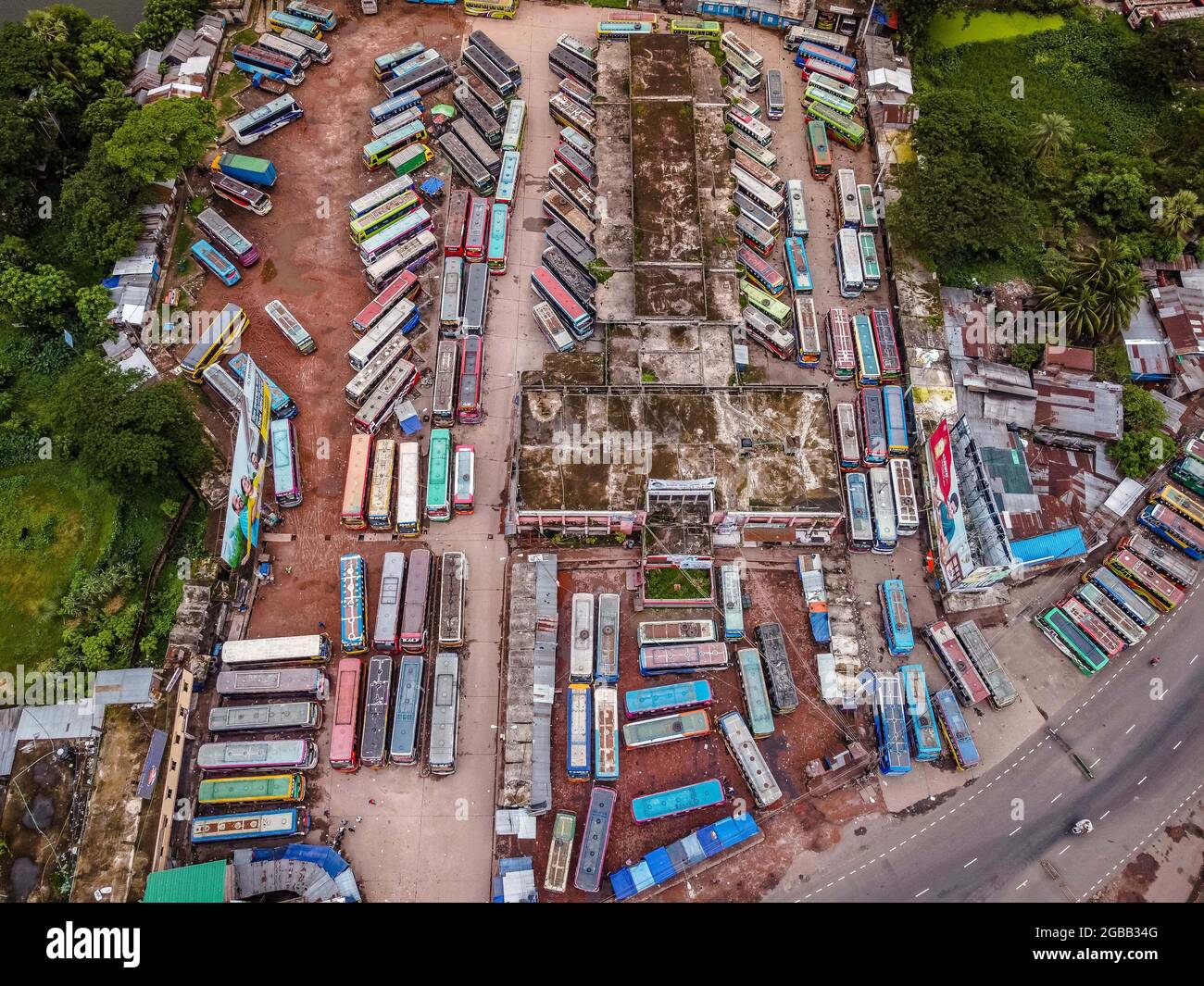 Aerial view taked with a drone, of buses line up at the Barishal Bus ...
