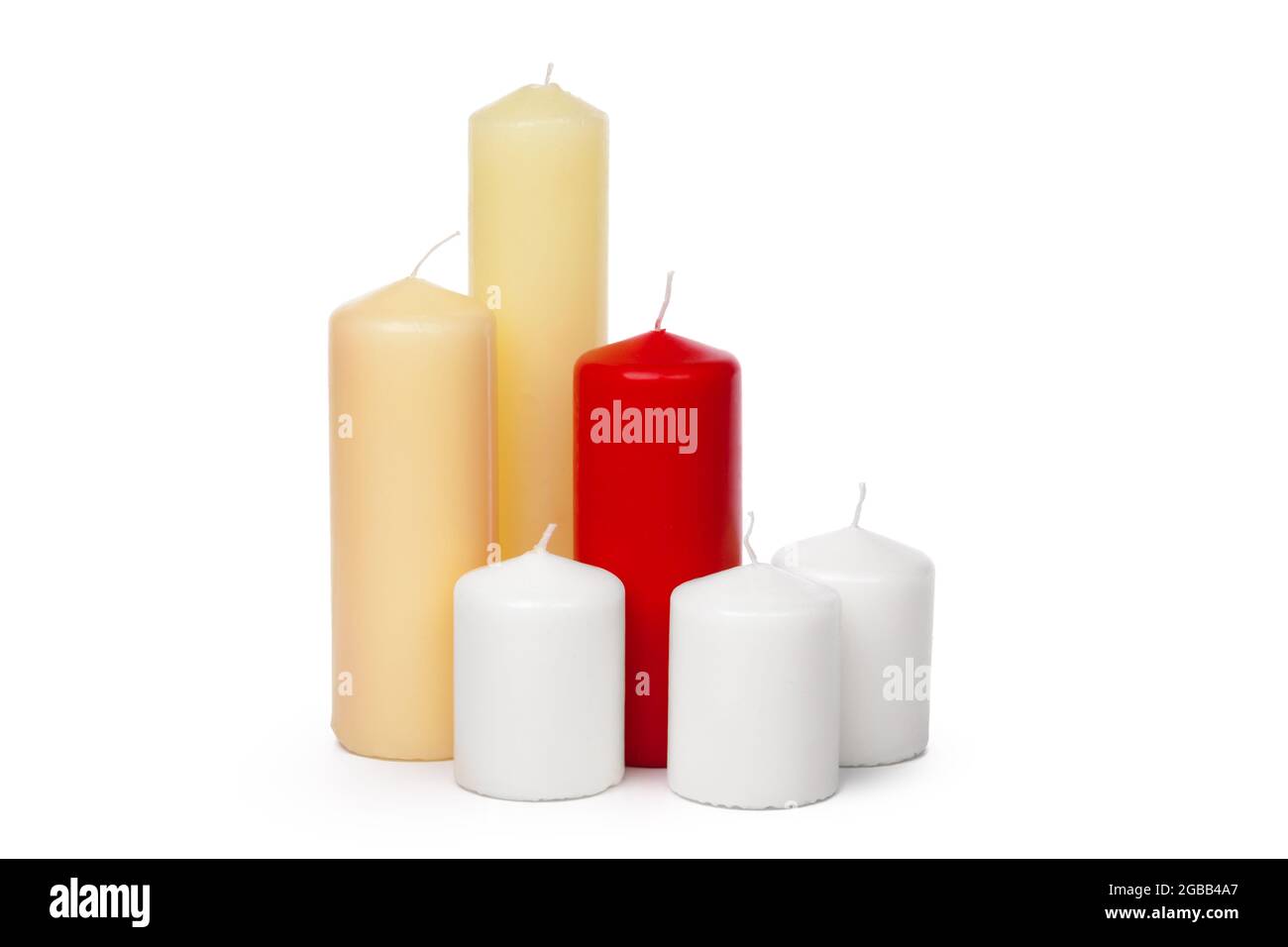 Colored candles of different size on white background Stock Photo - Alamy