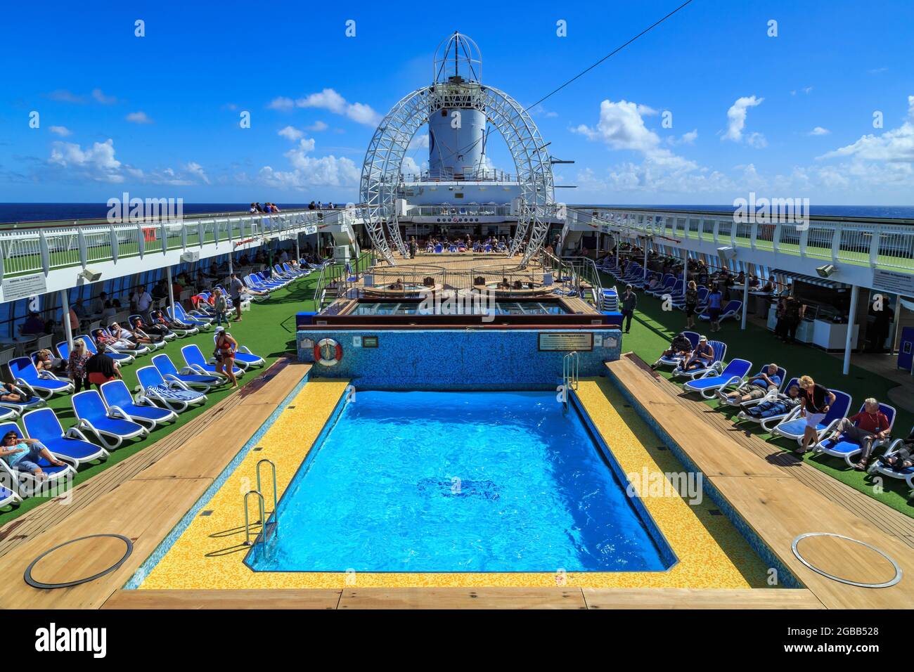 View of the pool deck of a cruise ship on a sunny day. Photographed on ...