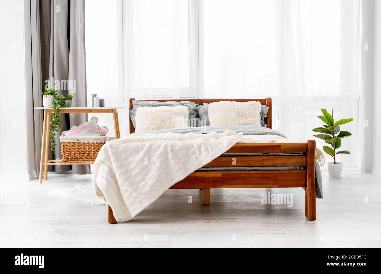 Modern interior with bed Stock Photo - Alamy