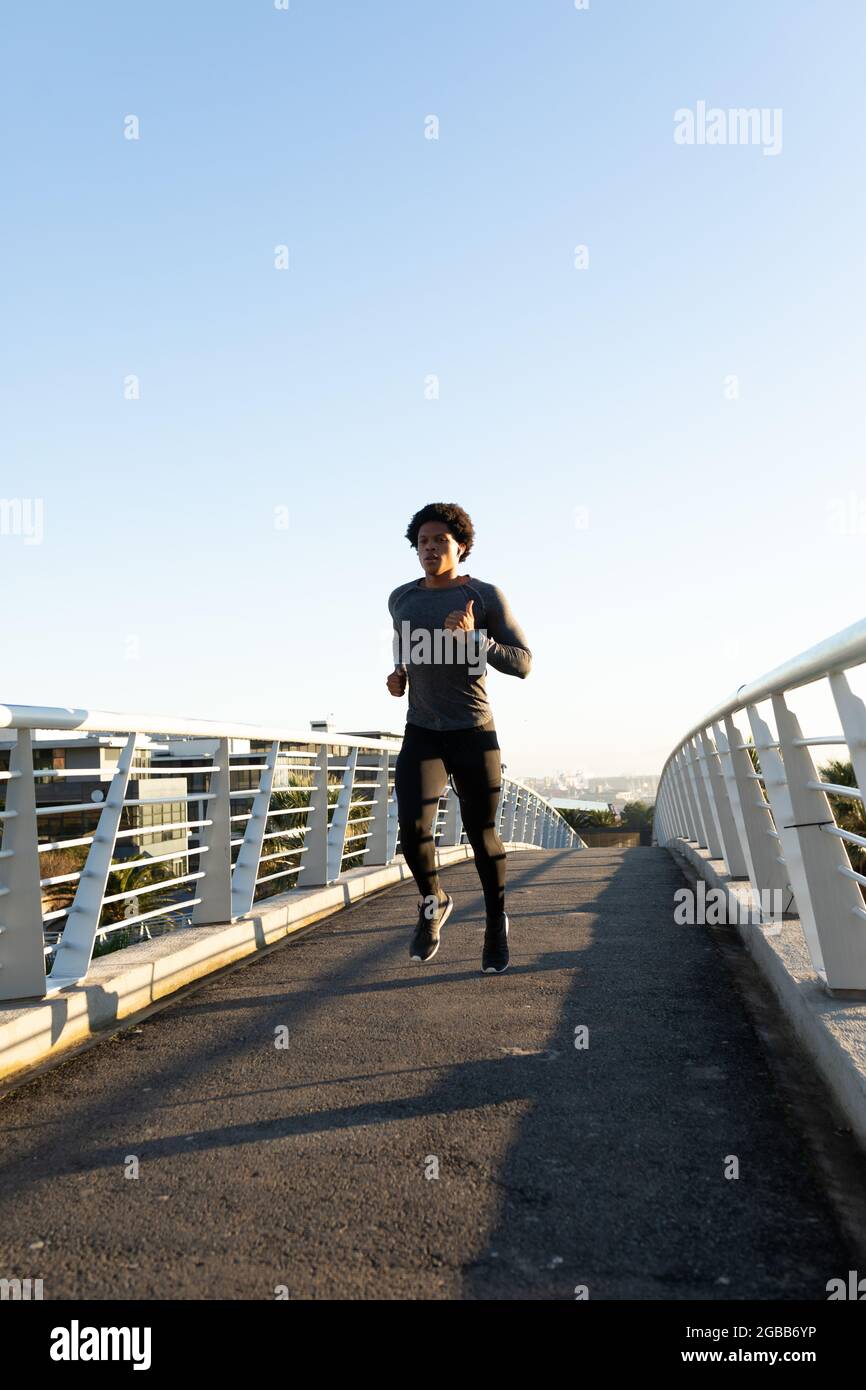 African american man running hi-res stock photography and images - Alamy