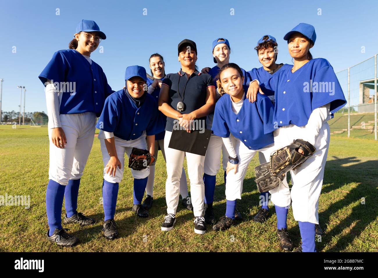 Happy coach standing hi-res stock photography and images - Alamy