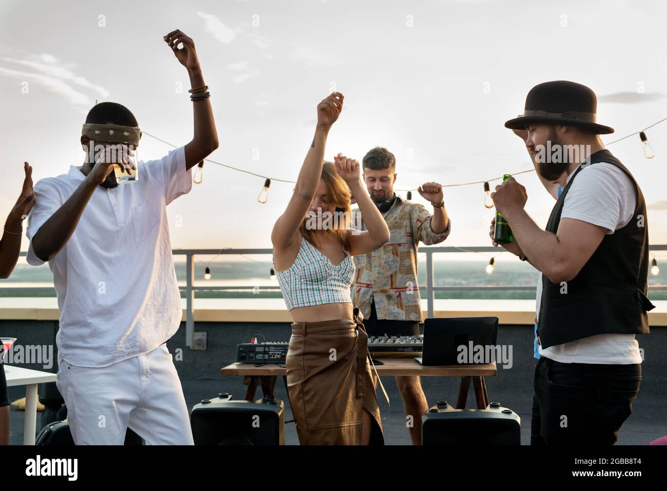 Happy friends dancing outdoor hi-res stock photography and images - Alamy