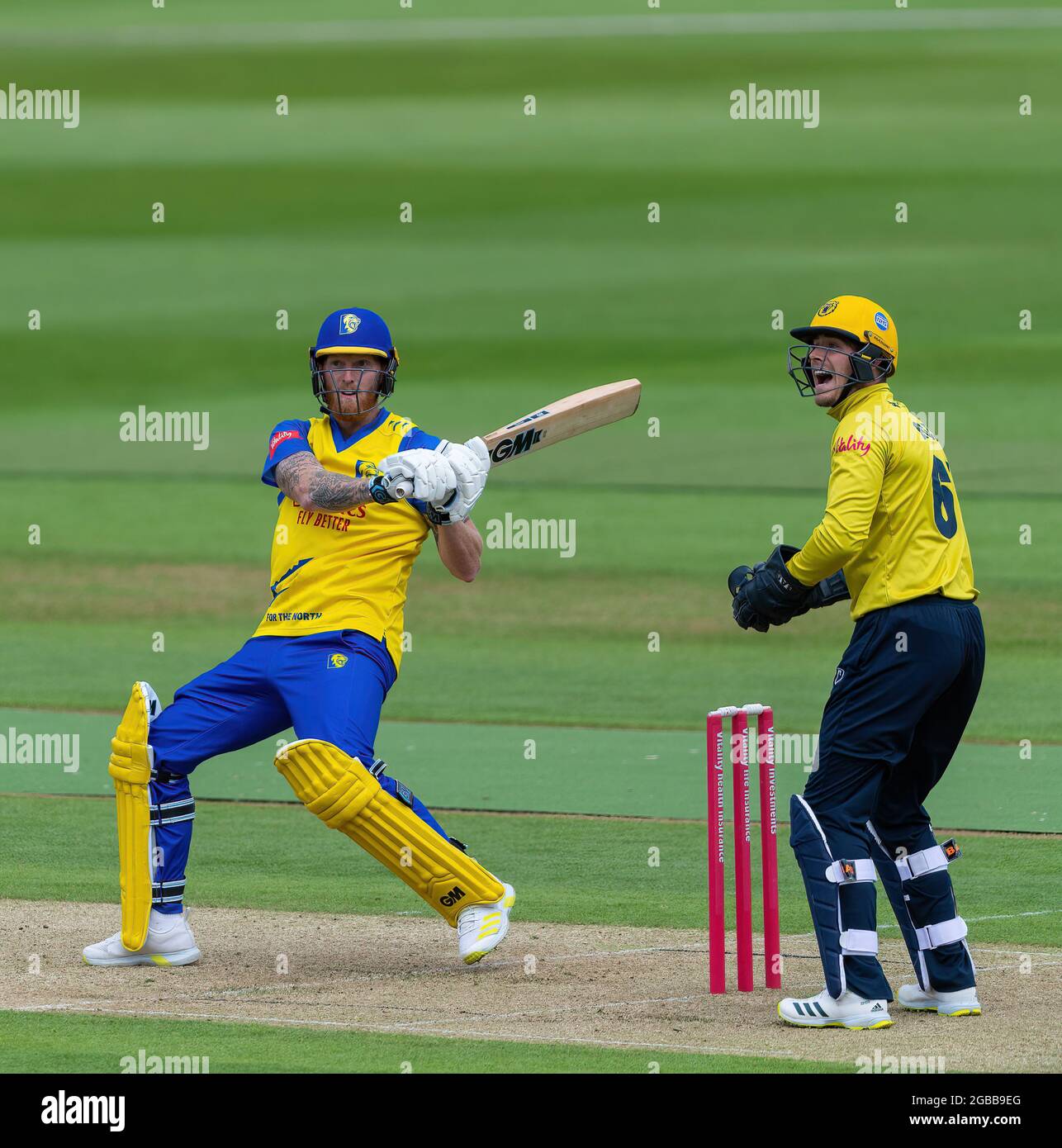 Durham's Ben Stokes batting watched by Bears keeper Michael Burgess ...