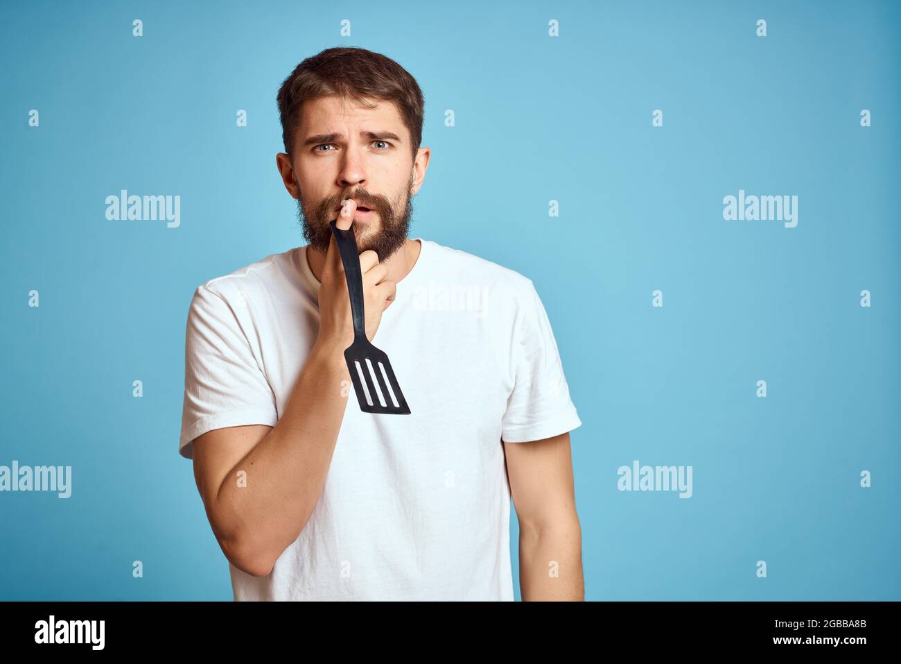 man in white t-shirt apples in hands fruit lifestyle light background ...