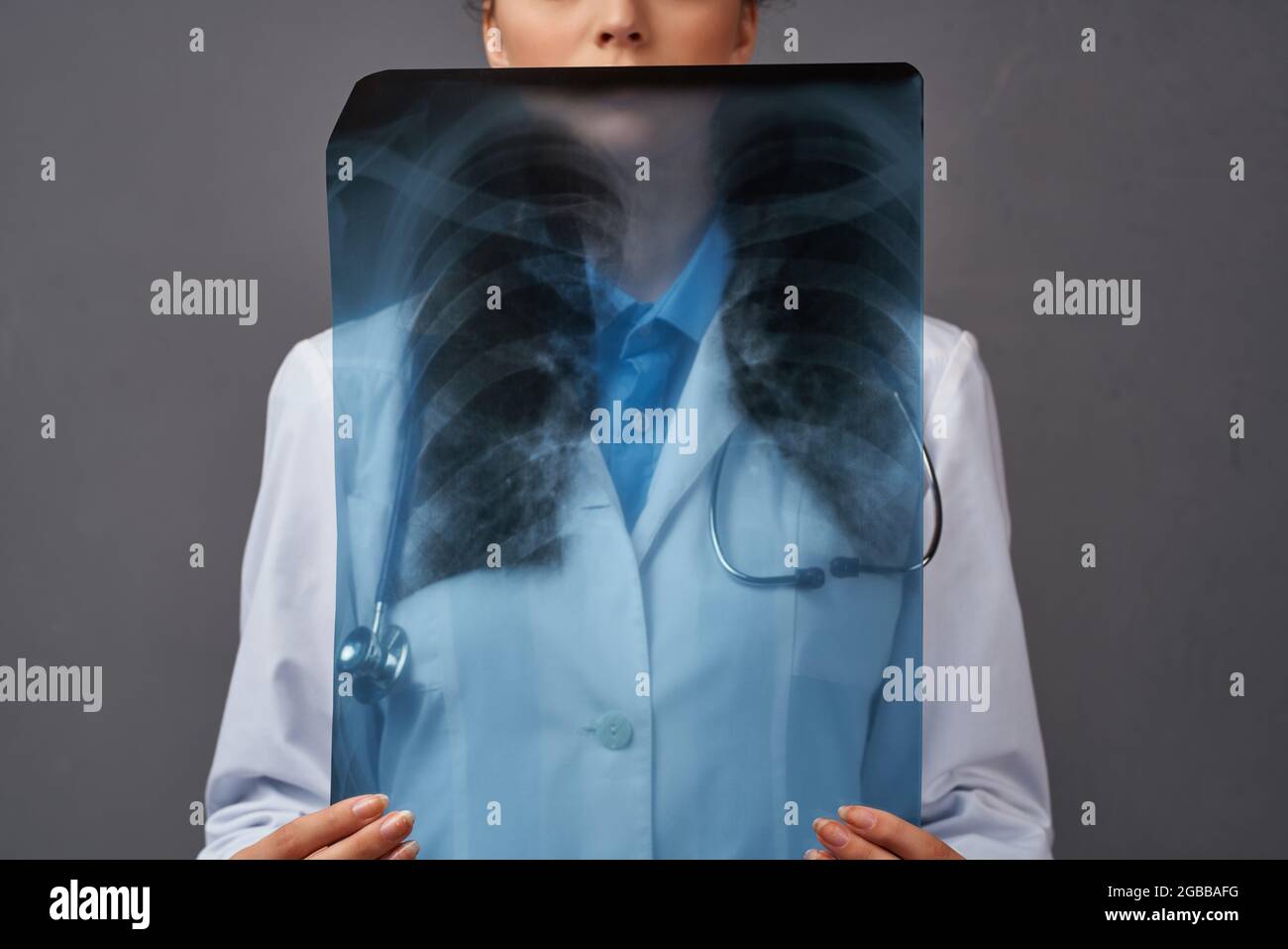 Woman in white coat radiologist professional Stock Photo - Alamy