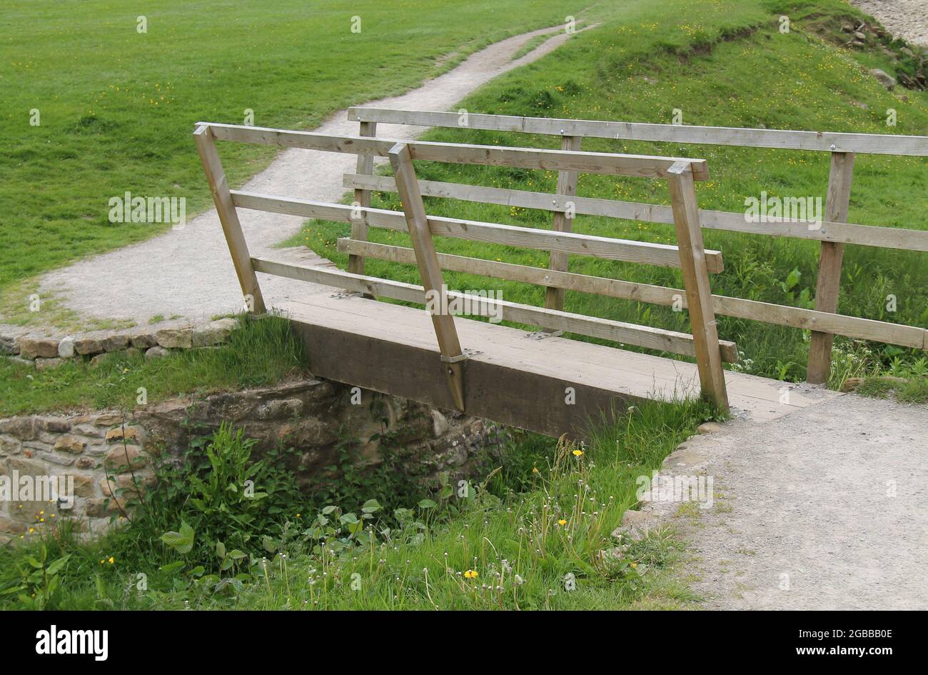 A Narrow Wooden Footbridge Over a Small Stream Stock Photo - Alamy