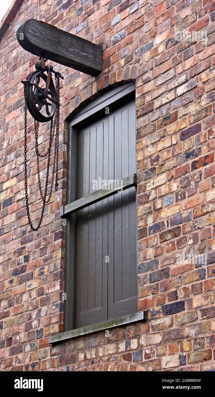 A Traditional Loading Pulley from a Warehouse Gantry Stock Photo - Alamy