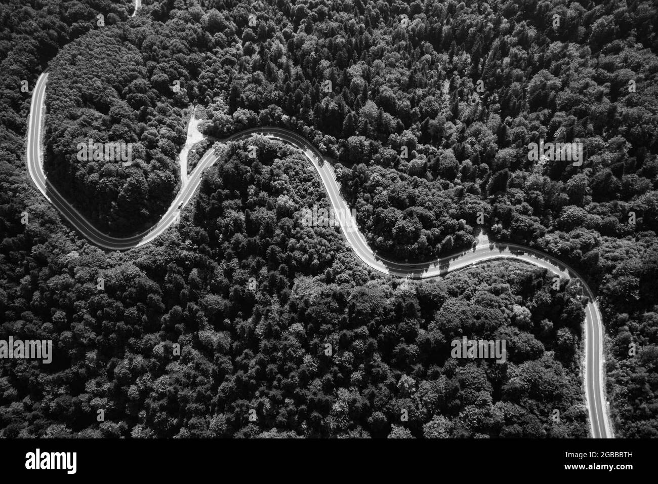 Aerial view on mountain road from drone Stock Photo - Alamy