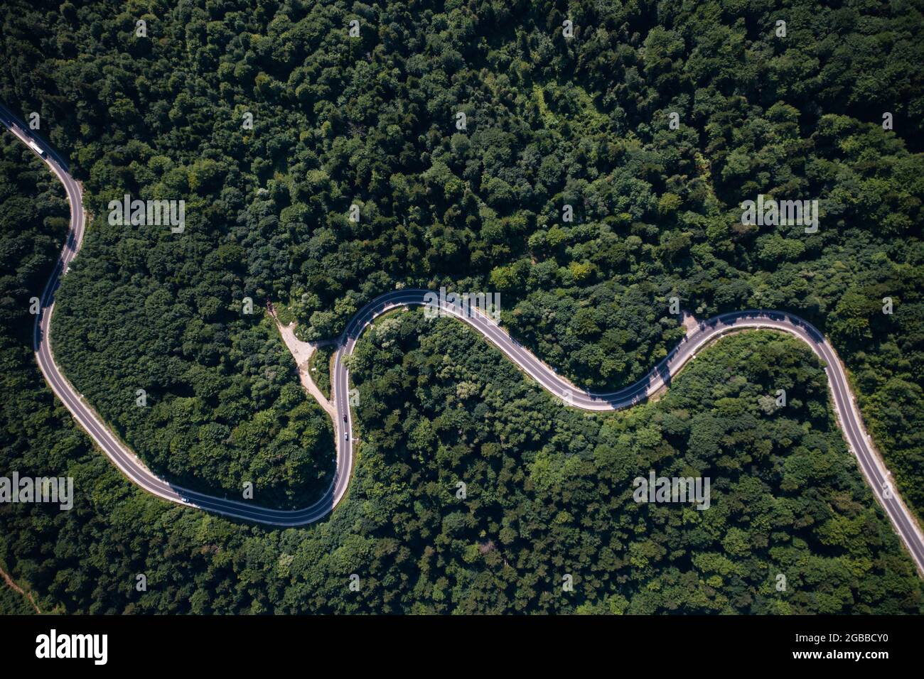 Aerial view on mountain road from drone Stock Photo - Alamy