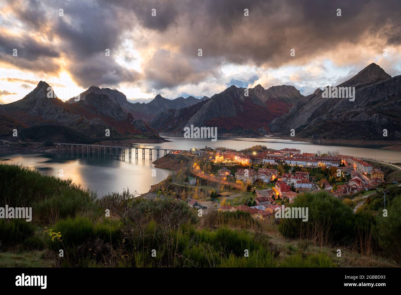 Riano cityscape at sunset with mountain range landscape during Autumn ...
