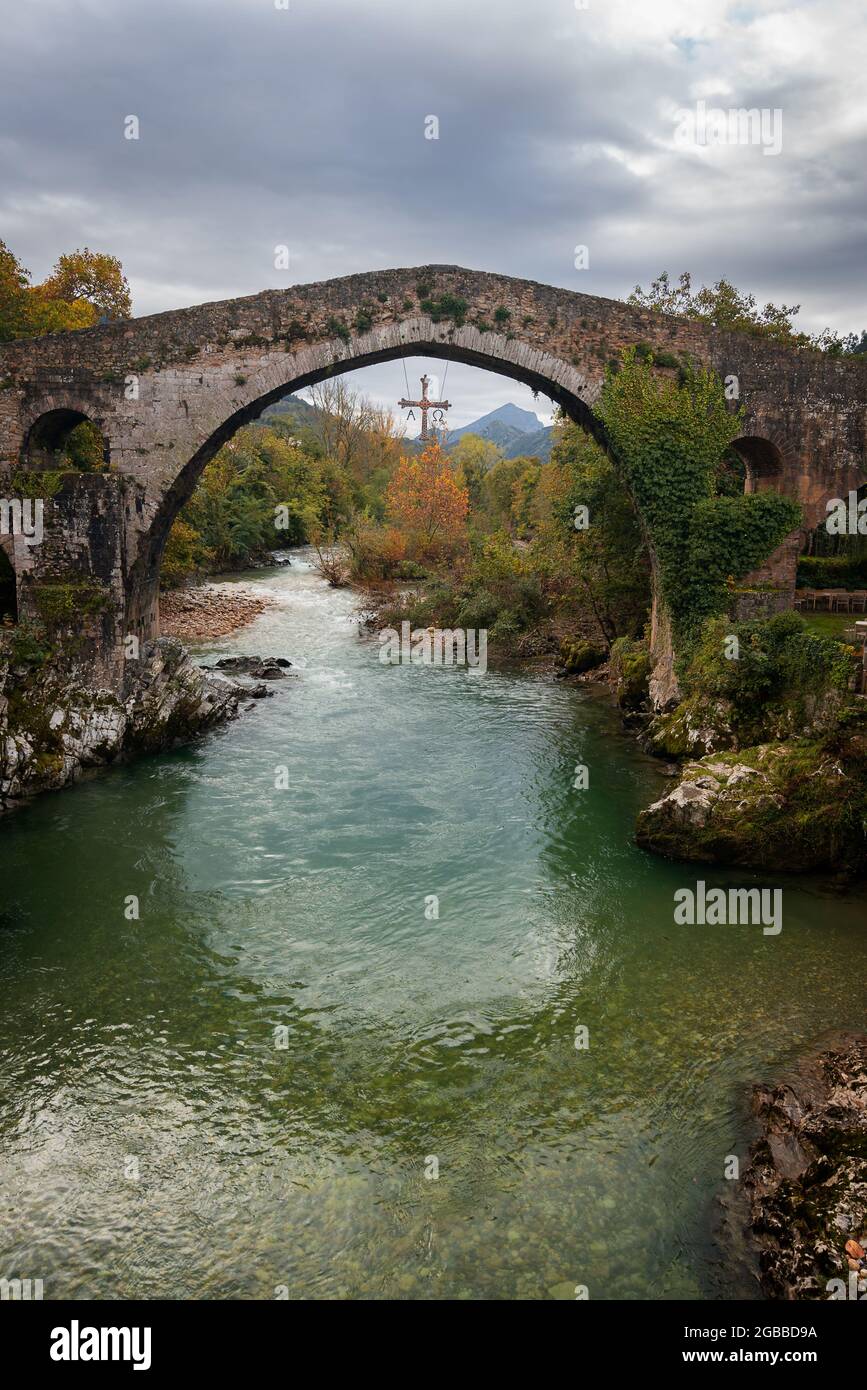 Cangas de Onis historic medieval Roman bridge over the Sella River in ...