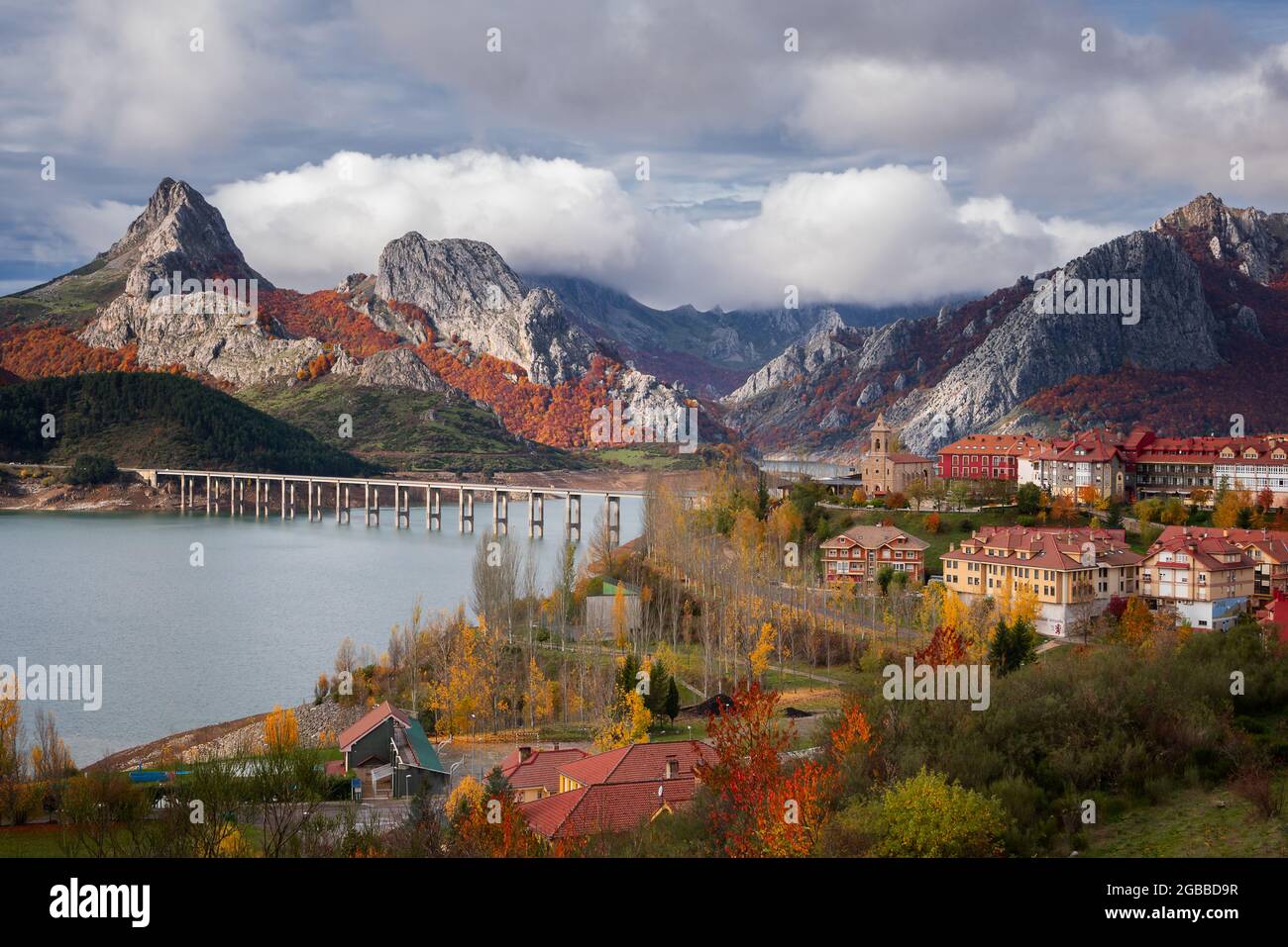 Riano cityscape at sunrise with mountain range landscape during Autumn ...