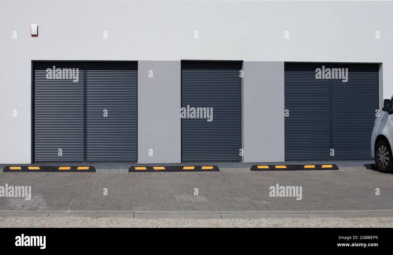 Car stopper installed in the parking lot in front of the company's ...