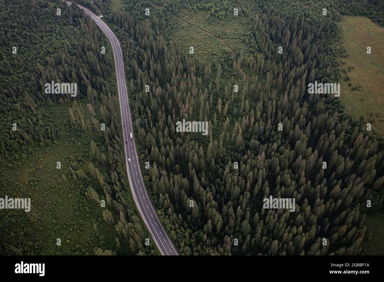 Aerial view on mountain road from drone Stock Photo - Alamy