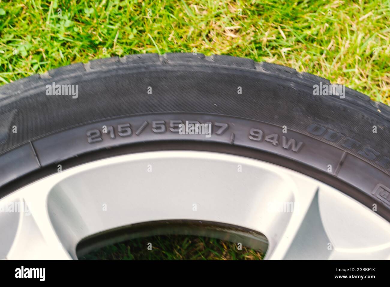 Car tire with aluminum rim Stock Photo - Alamy