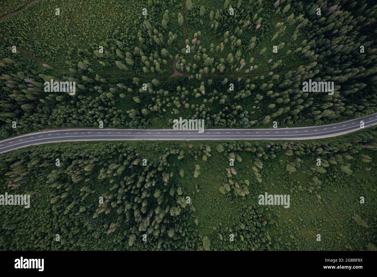 Aerial view on mountain road from drone Stock Photo - Alamy