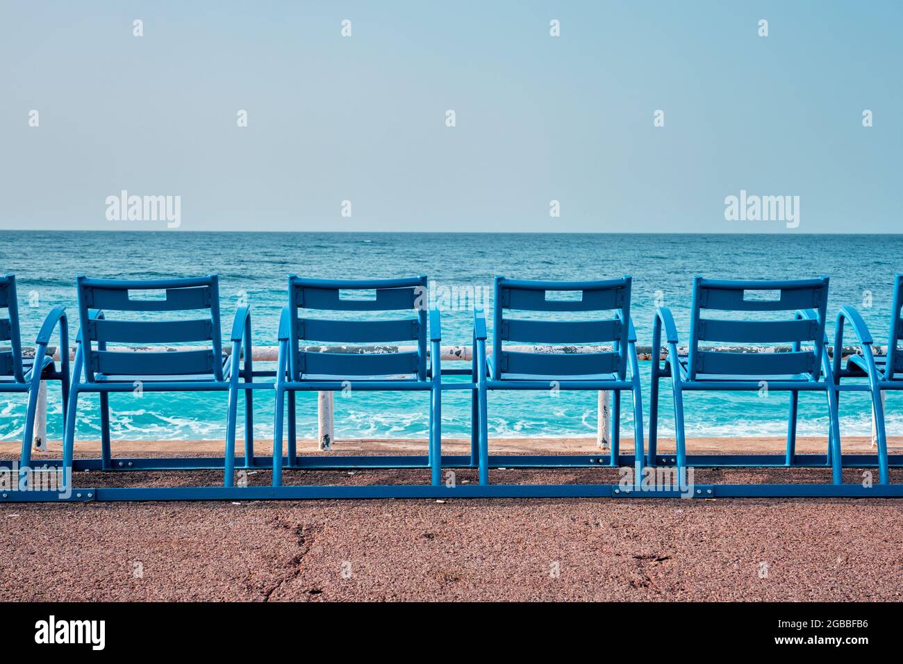 Famous blue chairs on beach of Nice, France Stock Photo - Alamy