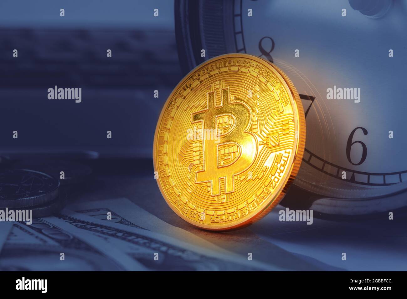bitcoin and alarm clock Stock Photo - Alamy