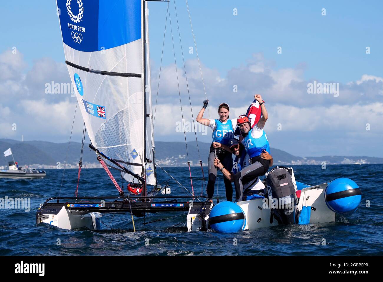 Great Britain’s John Gimson and Anna Burnet celebrate winning silver in ...