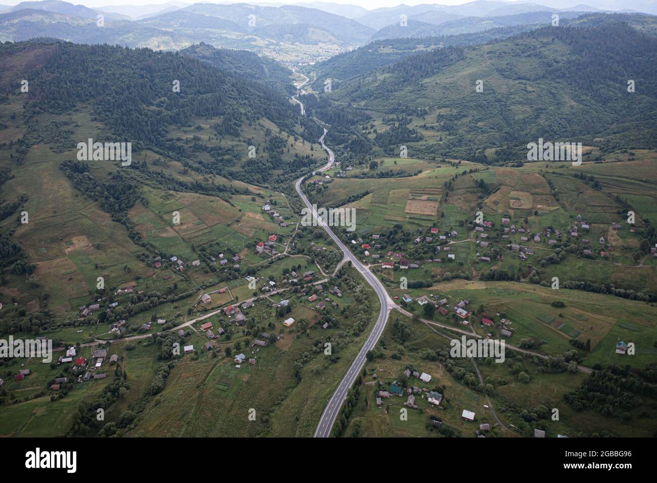 Aerial view on mountain road from drone Stock Photo - Alamy