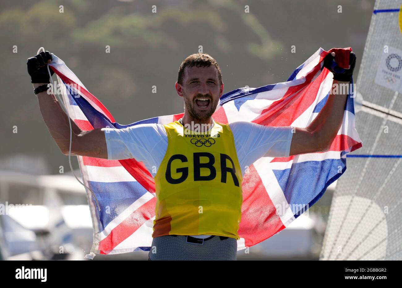 Great Britain's Giles Scott celebrates his Gold after the Men’s Finn ...