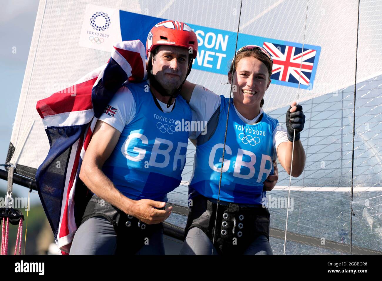Great Britain’s John Gimson and Anna Burnet celebrate winning silver in ...