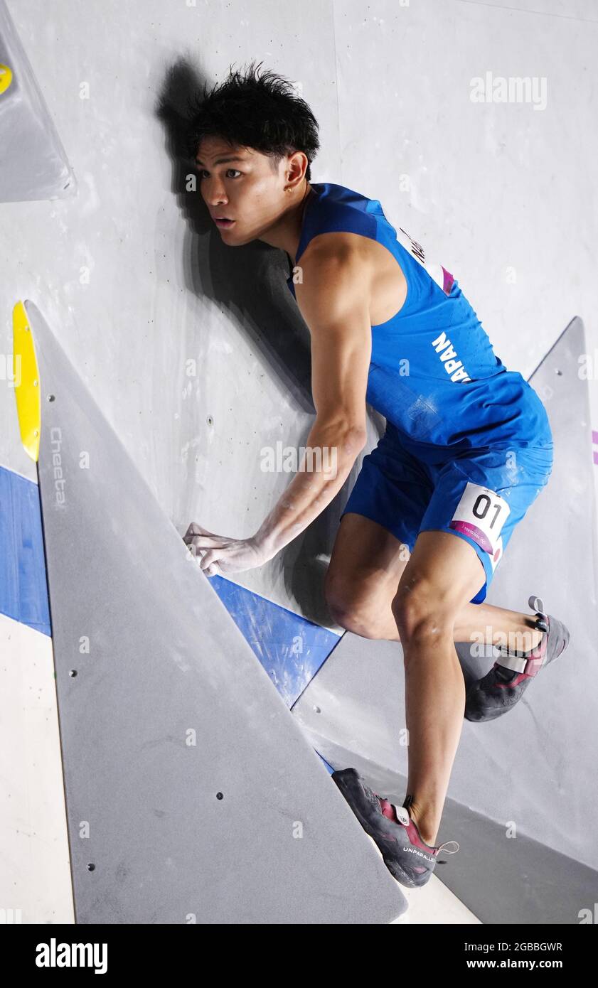 Japan's Tomoa Narasaki competes in the bouldering qualification round ...