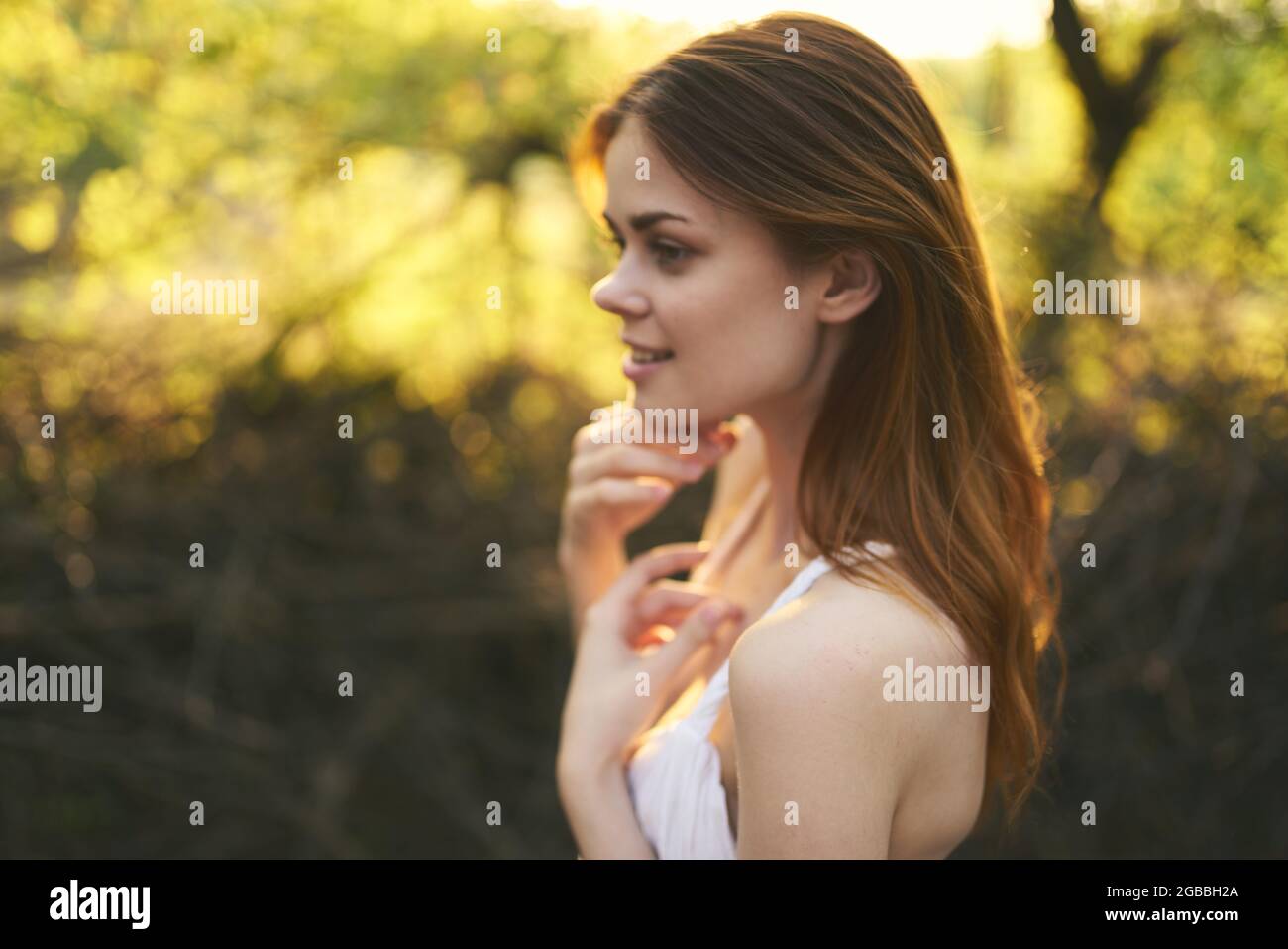 woman summer outdoors green trees fresh air posing Stock Photo - Alamy