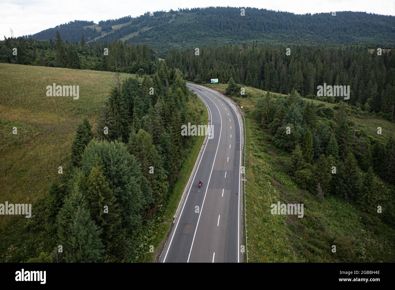 Aerial view on mountain road from drone Stock Photo - Alamy