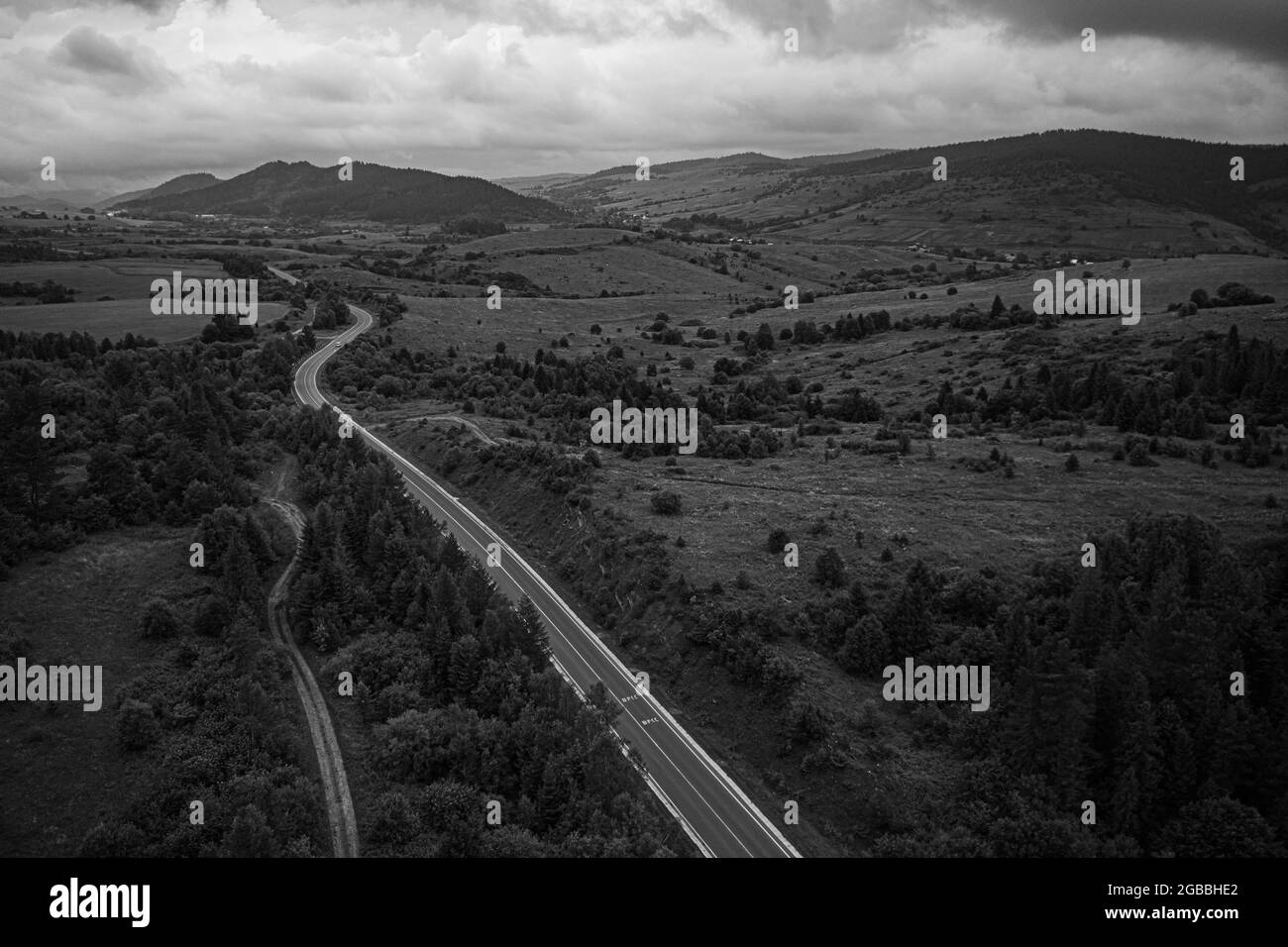 Aerial view mountain road on Black and White Stock Photos & Images - Alamy