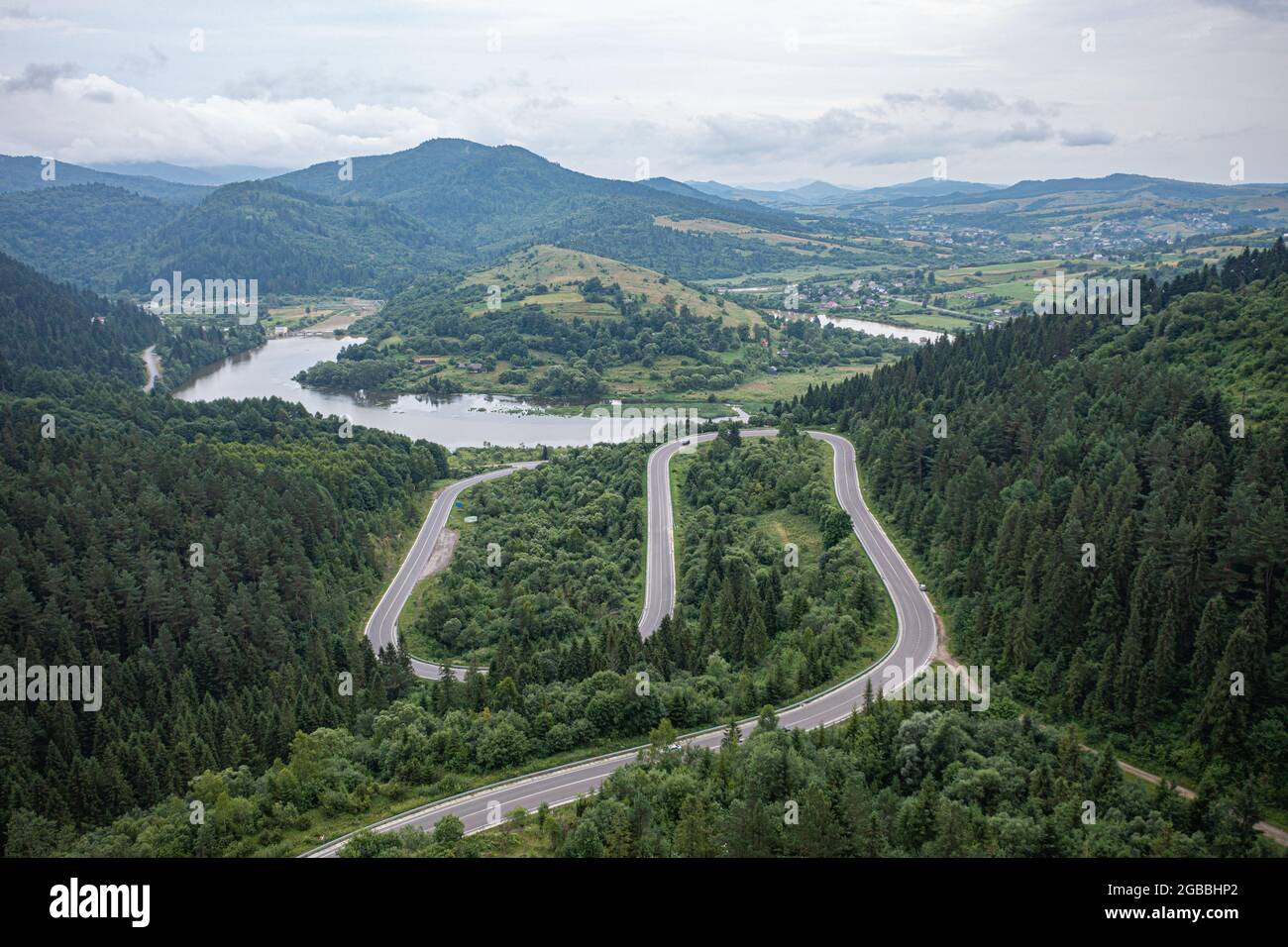 Aerial view on mountain road from drone Stock Photo - Alamy