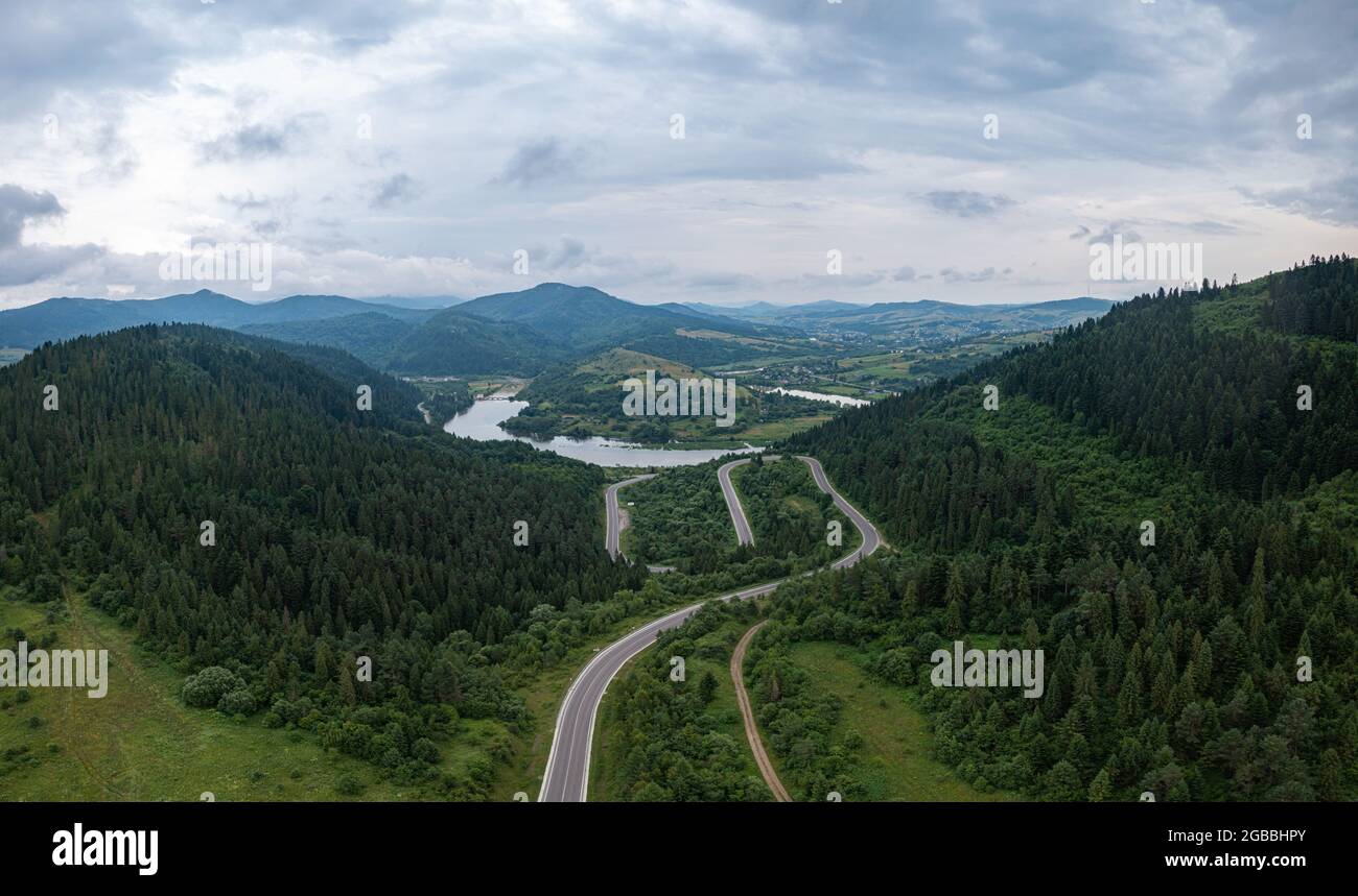 Aerial view on mountain road from drone Stock Photo - Alamy