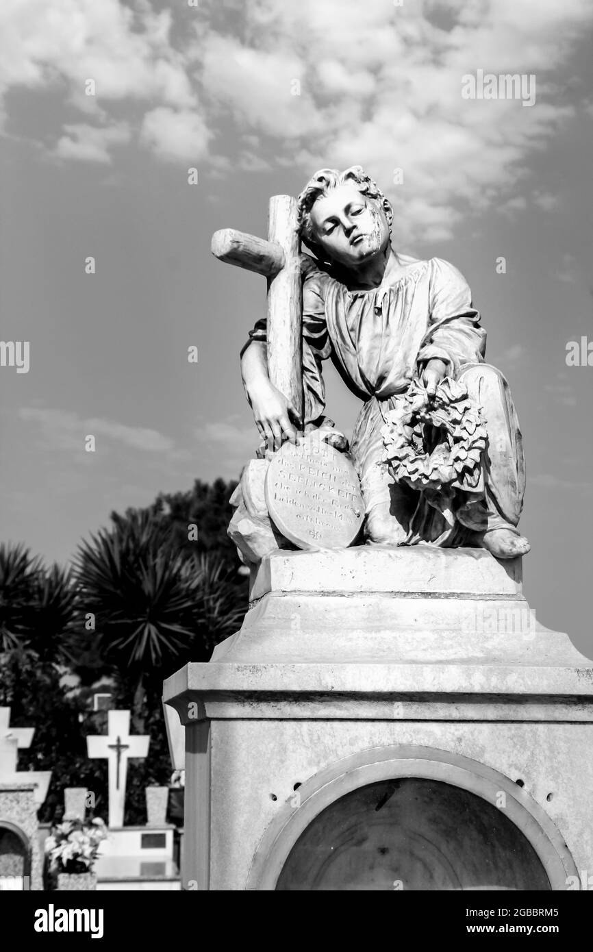 Stone Angel statue in the lonely cemetery of la Union village, Spain ...