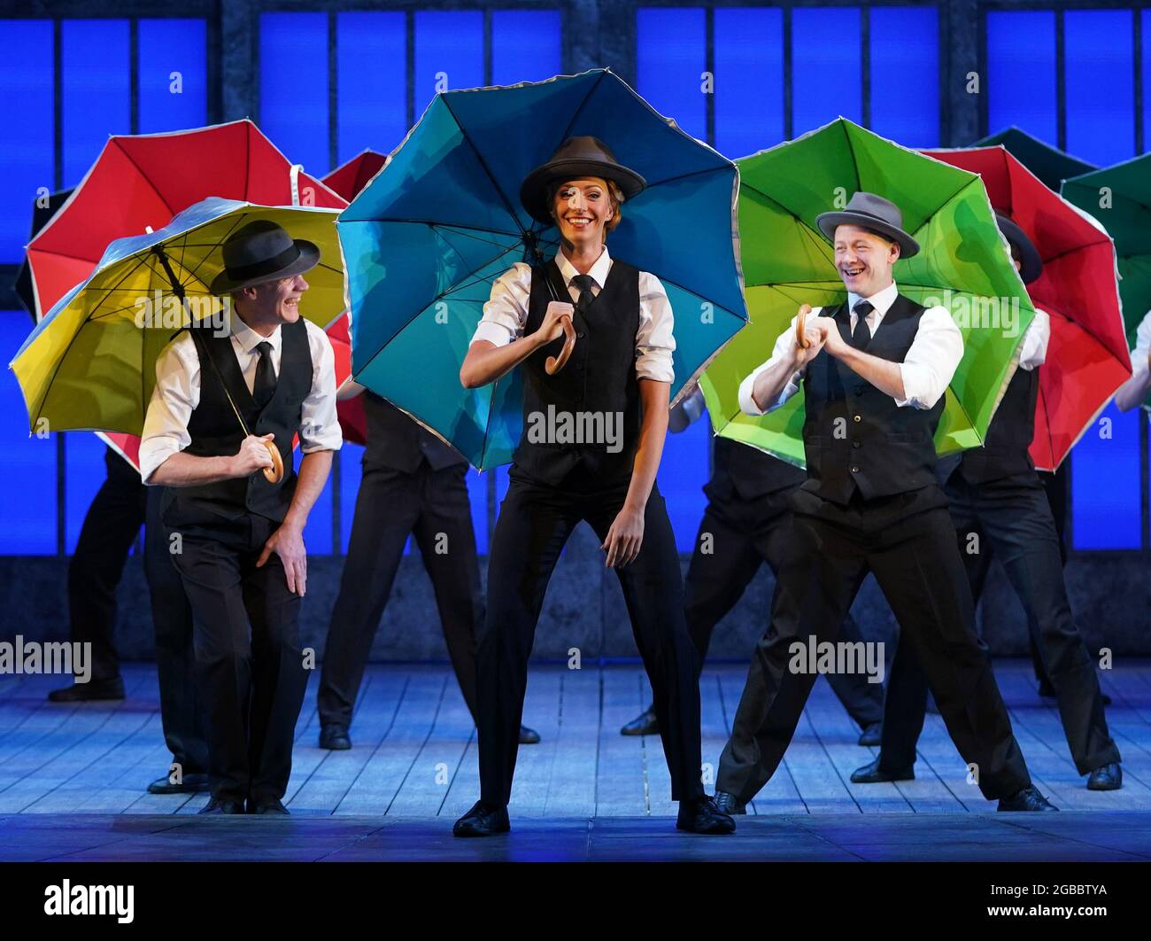 Cast members, including (left to right) Adam Cooper, Charlotte Gooch ...