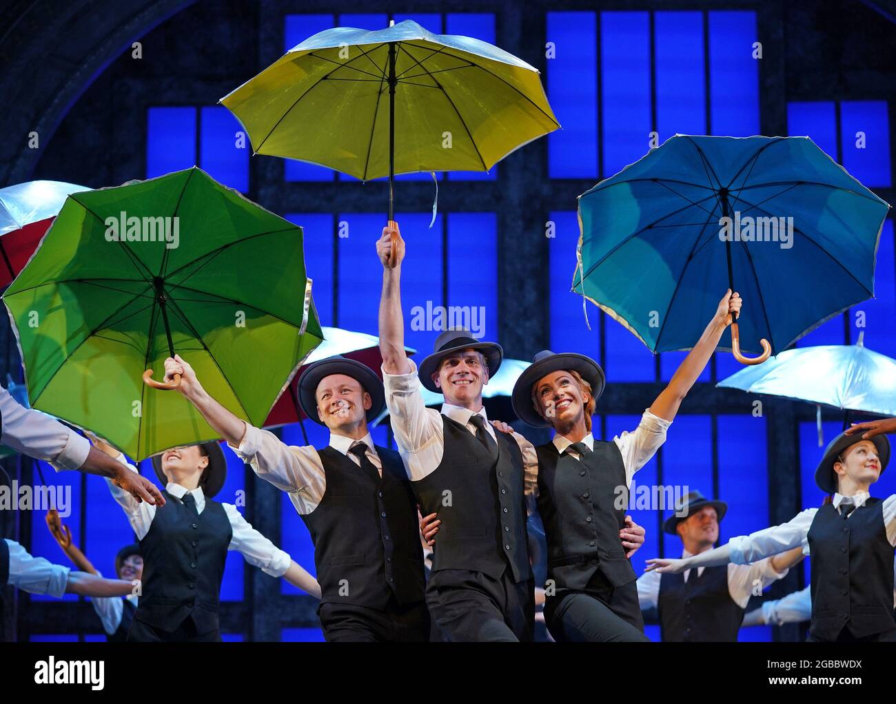 Cast members, including (left to right) Kevin Clifton, Adam Cooper and ...